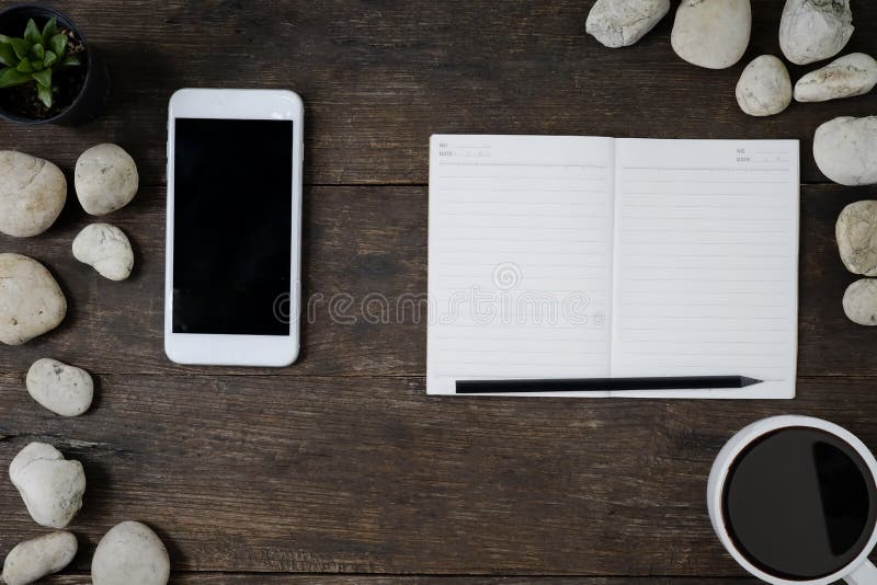 Notepad and Smartphone on Wood Desk. Stock Photo - Image of open ...