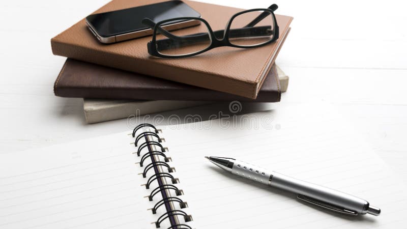 Notepad with stack of book stock photo. Image of diary - 60421078