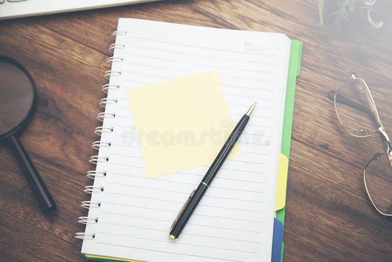 Notepad and Stationary with Keyboard on Table Stock Image - Image of ...
