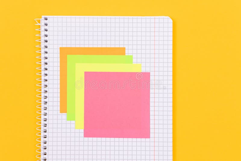A Notepad with Sticky Notes on Yellow Table Stock Photo - Image of memo ...