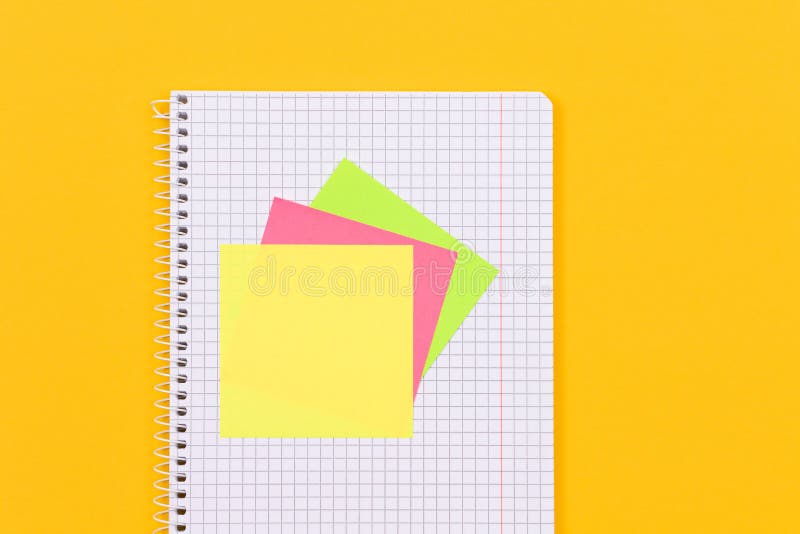 A Notepad with Sticky Notes on Yellow Table Stock Photo - Image of list ...