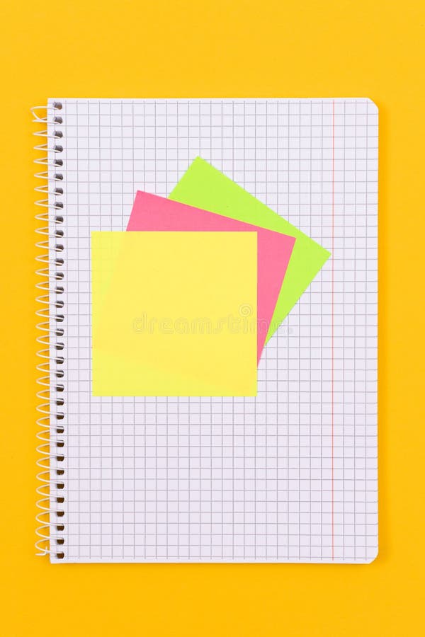 A Notepad with Sticky Notes on Yellow Table Stock Image - Image of ...