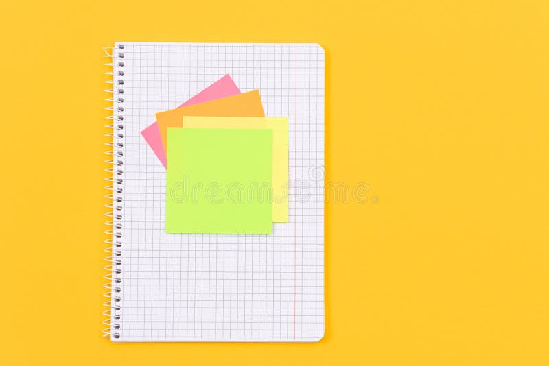 A Notepad with Sticky Notes on Yellow Table Stock Image - Image of note ...