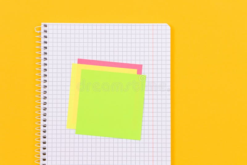 A Notepad with Sticky Notes on Yellow Table Stock Photo - Image of ...