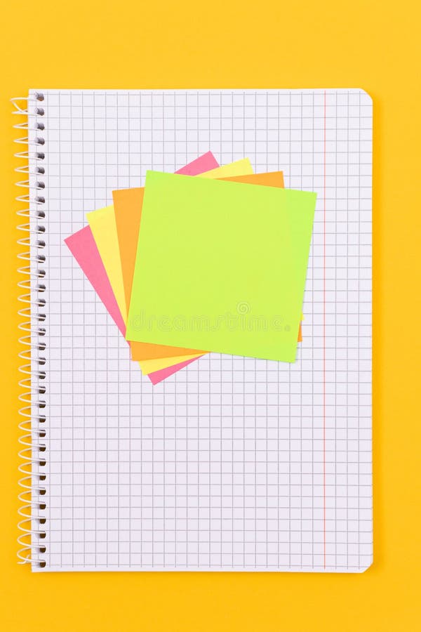 A Notepad with Sticky Notes on Yellow Table Stock Image - Image of memo ...