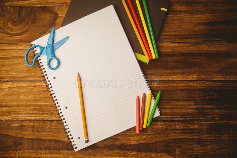 Notepad on student desk stock image. Image of table - 255407235