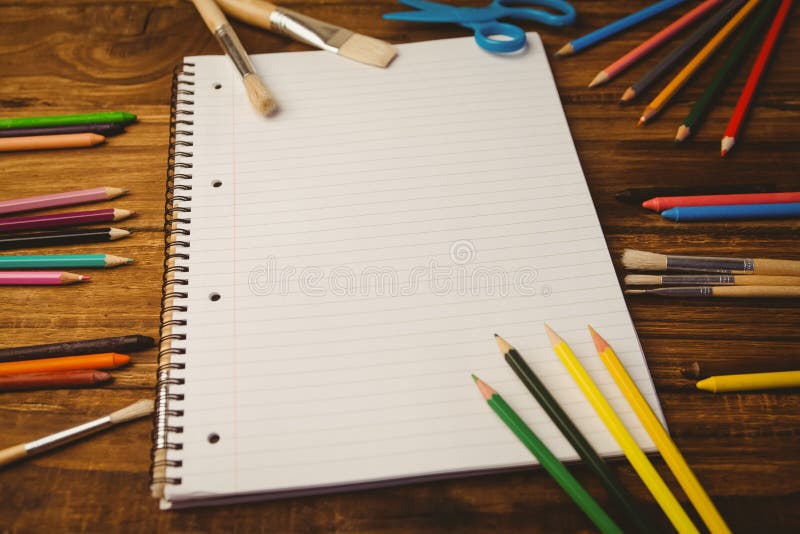 Notepad on student desk stock photo. Image of school - 255573174