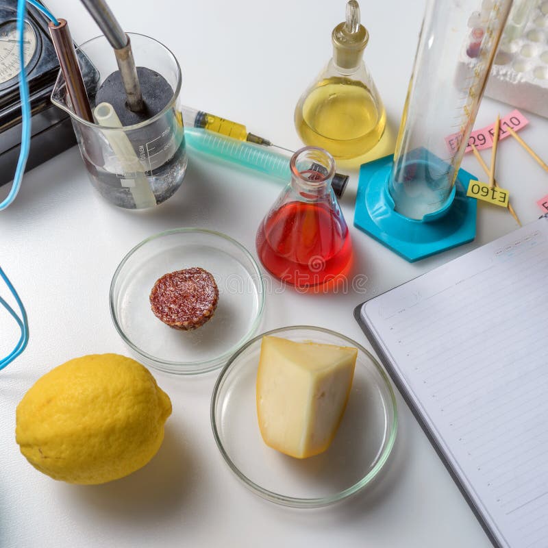 Notepad, Tablets with Additives E, Test Tubes and Laboratory Equipment ...