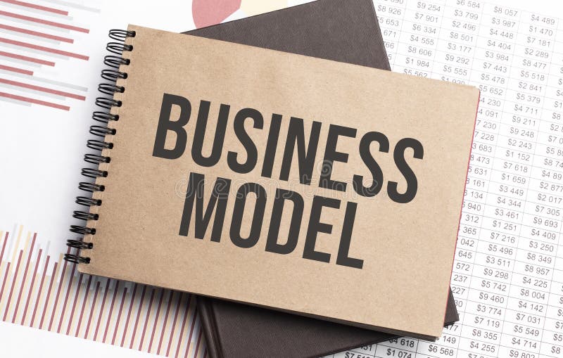 Notepad with Text Business Model on a Charts and Numbers. Business ...