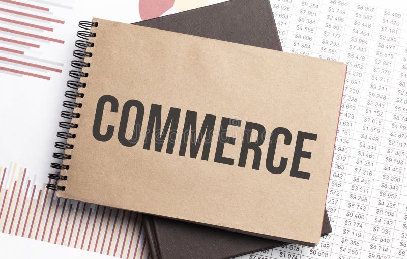 Notepad with Text Commerce on a Charts and Numbers. Business Concept ...