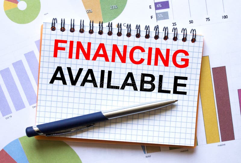 Notepad with Text Financing Available on Business Charts and Pen Stock ...