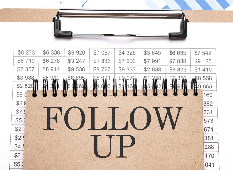 Notepad with Text Follow Up Do Bigger on a Charts and Numbers. Business ...