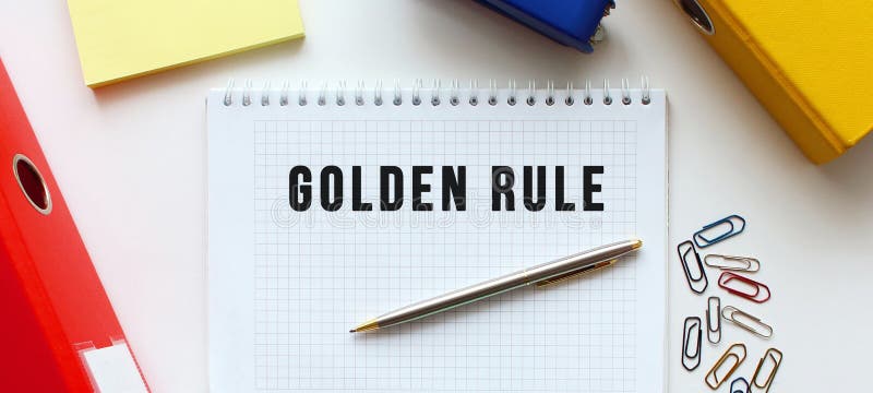 Notepad with Text GOLDEN RULES on a White Background, Near Document ...
