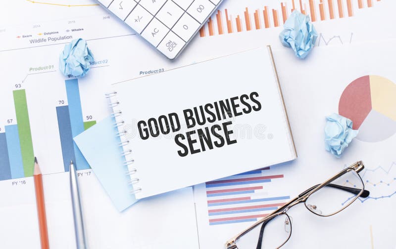 Notepad with Text GOOD BUSINESS SENSE on the Business Charts and Pen ...
