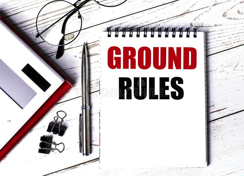 Notepad with Text GROUND RULES, Glasses, Paper Clips, White Calculator ...