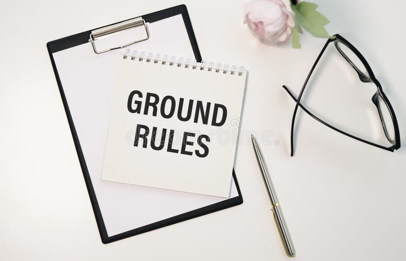Notepad with Text GROUND RULES on a White Background, Near Office ...