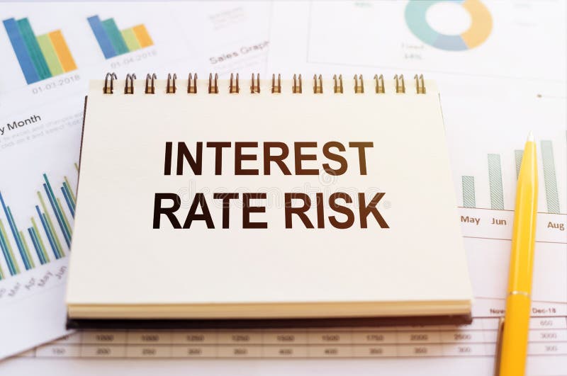 Notepad with the Text INTEREST RATE RISK on White Background with ...