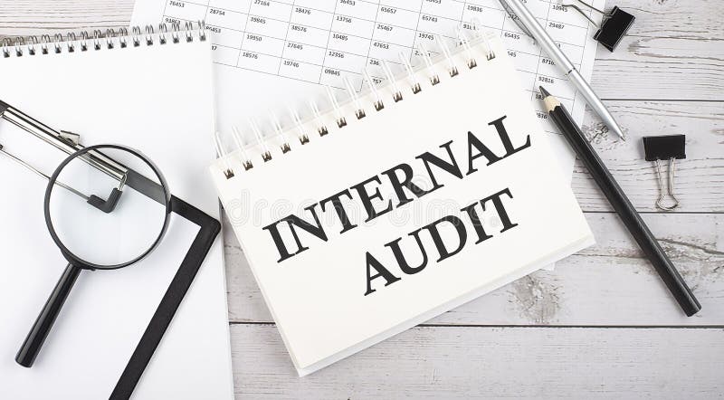 Notepad with Text INTERNAL AUDIT with a Pen,office Tools and Graphs on ...