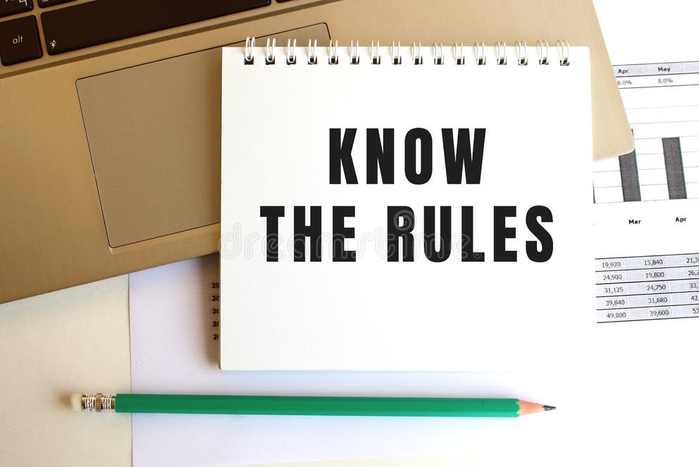 Notepad with the Text KNOW the RULES is on the Laptop Keyboard ...