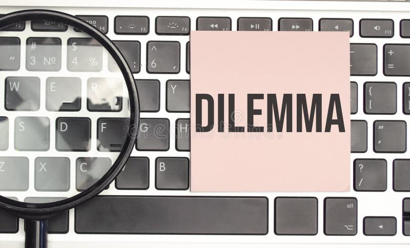 Notepad with the Text on Laptop DILEMMA Stock Image - Image of ...