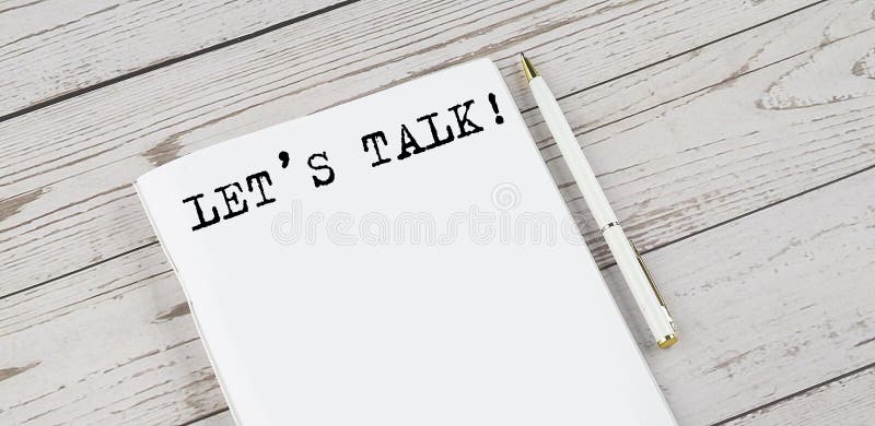 Notepad with Text LET`S TALK . White Background. Business Concept Stock ...
