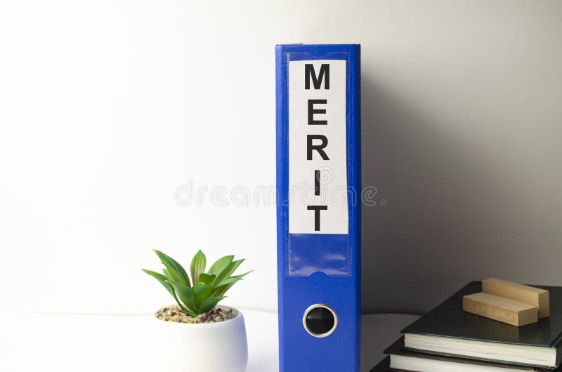 Notepad with Text Merit on the Business Charts and Pen,business Stock ...