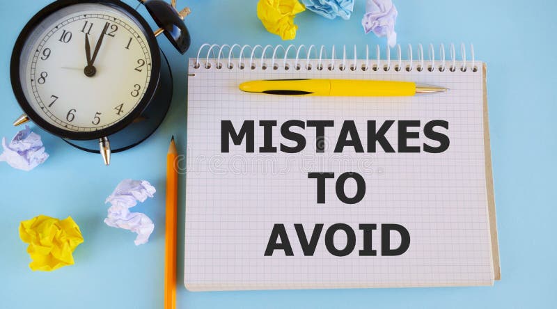 A Notepad with Text Mistakes To Avoid with Paper Clock Pen and Crumpled ... A Notepad with Text Mistakes To Avoid with Paper Clock Pen and Crumpled ...