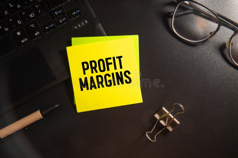 Notepad with Text NET PROFIT MARGIN with a Pen,office Tools and Graphs ...