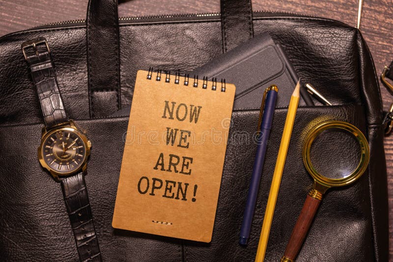 Notepad with Text Now Opening on a Charts and Numbers. Business Concept ...