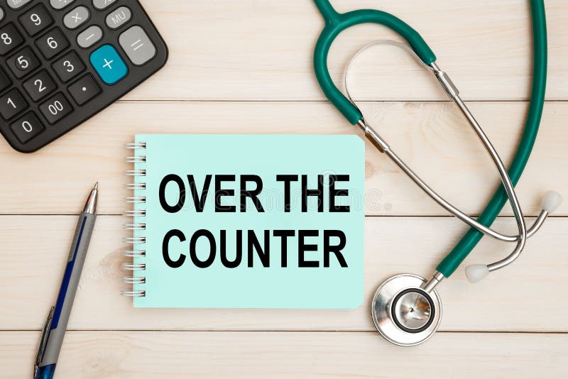 Notepad with Text OVER the COUNTER, Calculator and Stethoscope Stock ...