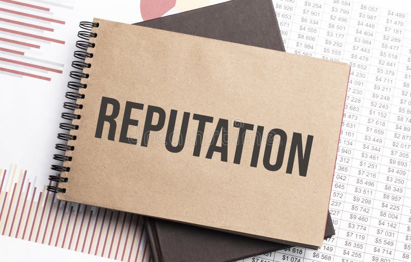 Notepad with Text Reputation on a Charts and Numbers. Business Concept ...