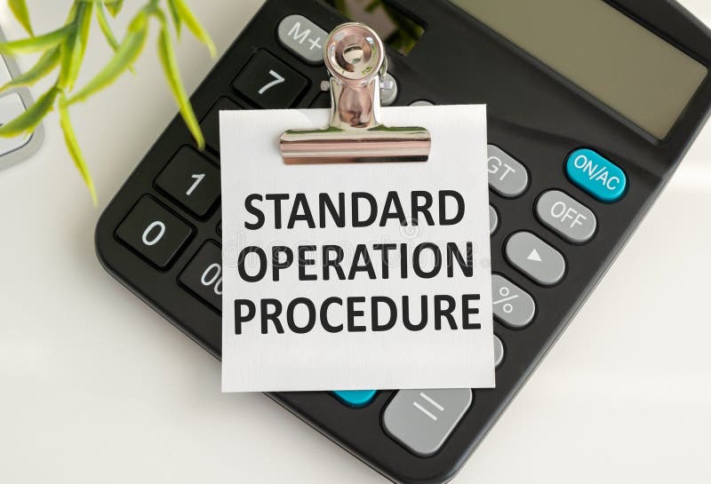 Standard Operation Procedure Words on Wooden Blocks and Hand Stock ...