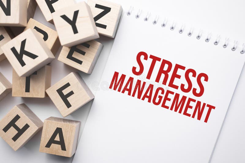 Notepad with Text Stress Management and Wooden Cubes with Letters Stock ...
