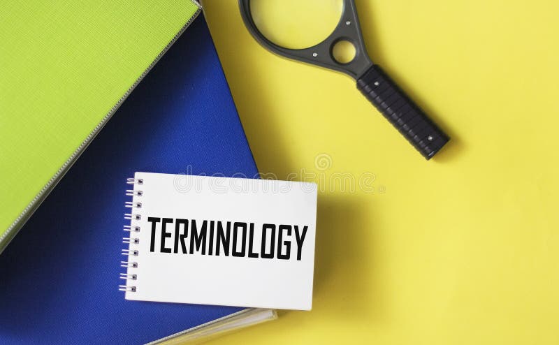 Notepad with Text TERMINOLOGY on Yellow Background with Blue Folders ...