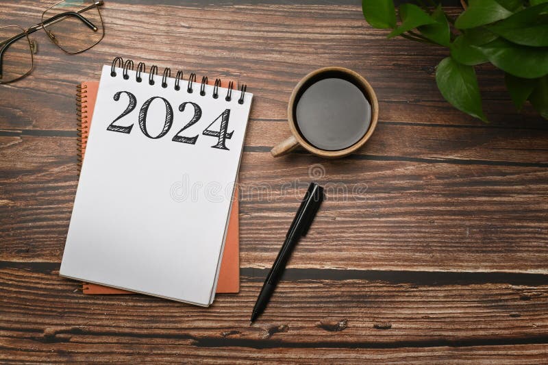 Notepad with 2024 Text To Apply New Year 2024 Resolutions. Goals ...