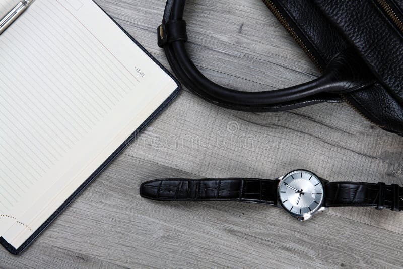 Notepad and Watches Bag on the Texture Stock Photo - Image of cover ...