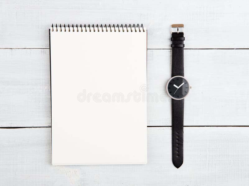 Notepad and Watches on the Wooden Desk Stock Image - Image of black ...