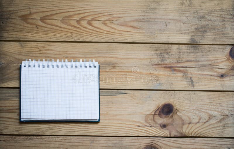 Notepad on the Wooden Table Stock Image - Image of office, wooden ...