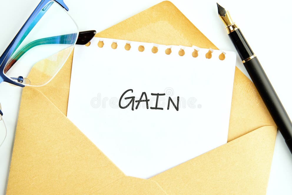 Notepad with the Word Gain Written in Bold Letters Sits Inside a Light ...