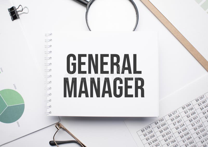On the Notepad for Writing the Text GENERAL MANAGER, Magnifier,charts ...
