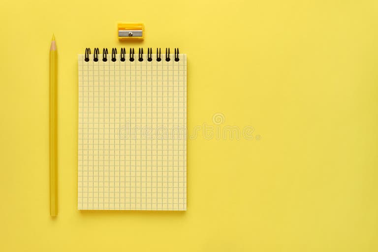 Notepad and Yellow Pencil are on the Left Side of the Screen Stock ...