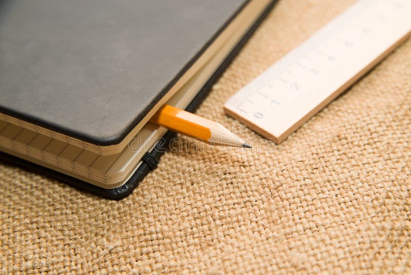 Notepads, Pencil and Wooden Ruler on the Old Tissue Stock Image - Image ...