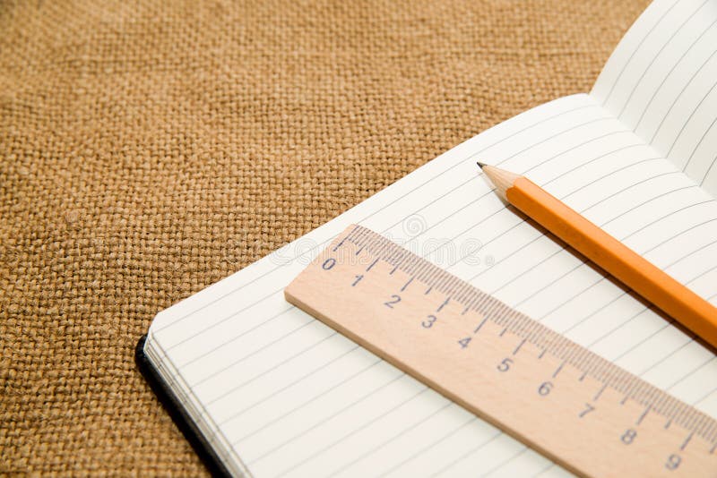 Notepads, Pencil and Wooden Ruler on the Old Tissue Stock Photo - Image ...