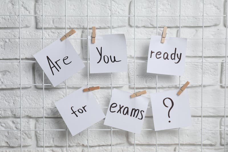 Notes with Words are You Ready for Exams Hanging on White Brick Wall ...