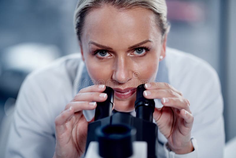 Nothing Escapes Her Sharp Eyes. Portrait of a Mature Scientist Using a ...