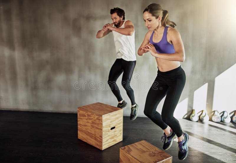 Nothing Good Ever Came Easy. Two Young People Box Jumping As Part of ...