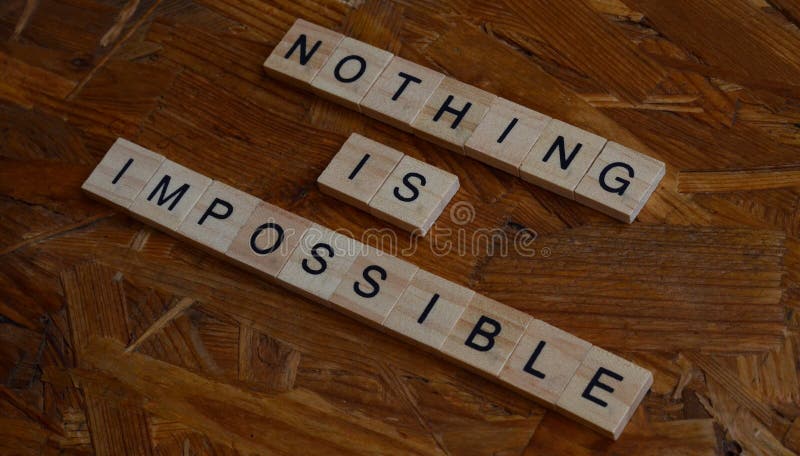 Nothing is Impossible Text on Wooden Square, Business and Motivation ...
