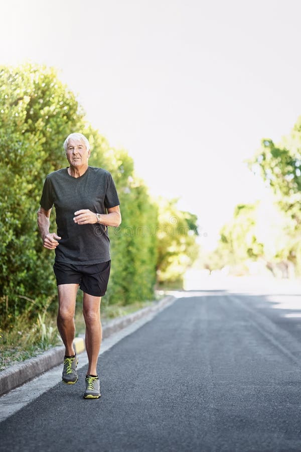 Nothing Raises Your Energy Better Than Exercise. a Senior Man Out for a ...