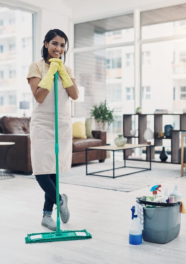 Nothing Says Welcome Home Like a Clean House. a Young Woman Cleaning ... Nothing Says Welcome Home Like a Clean House. a Young Woman Cleaning ...