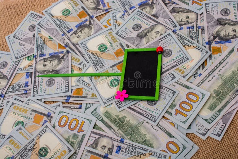 Notice Board Placed on US Dollar Banknotes Stock Photo - Image of bills ...